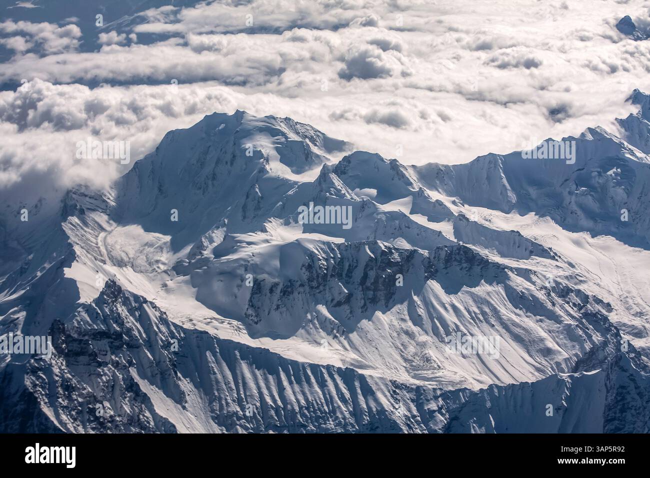 Aerial view of majestic Himalayan mountain range covered in snow and ...