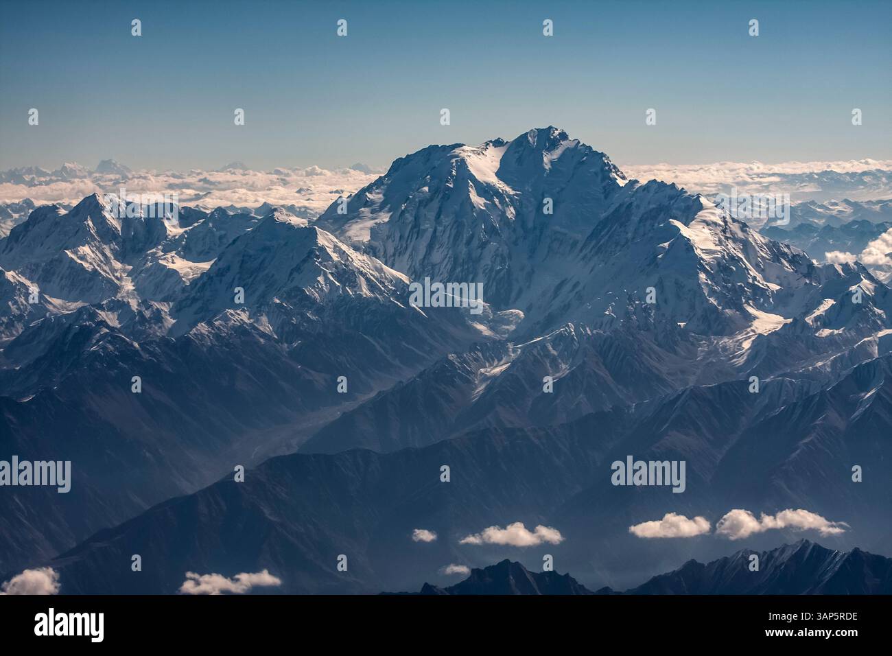 Aerial view of majestic snow-covered peaks in the Himalayan mountain ...