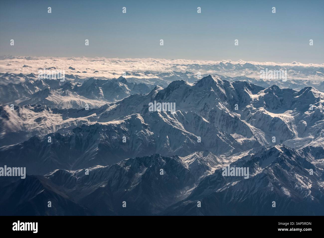 Aerial view of the beautiful snowy peaks of the Himalayan mountain ...