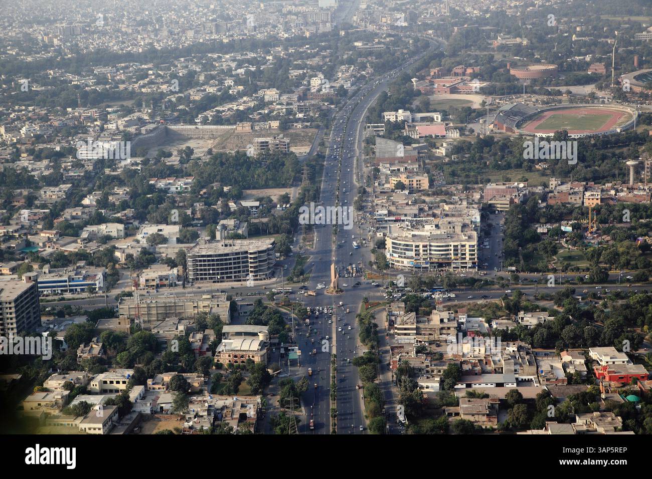 Aerial view of a bustling cityscape with modern buildings and busy ...
