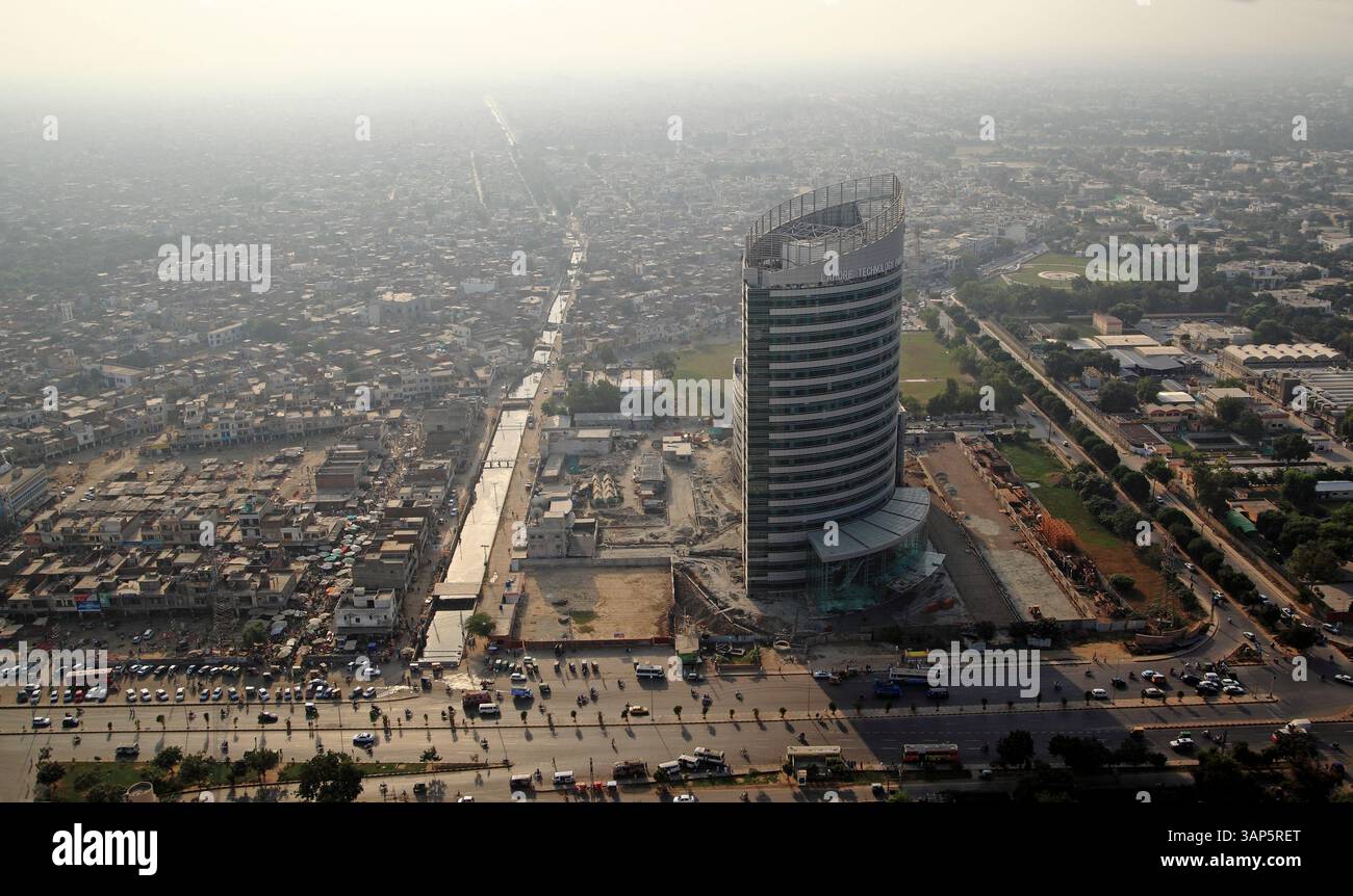 Aerial view of modern cityscape with skyscrapers and busy roads, Lahore ...