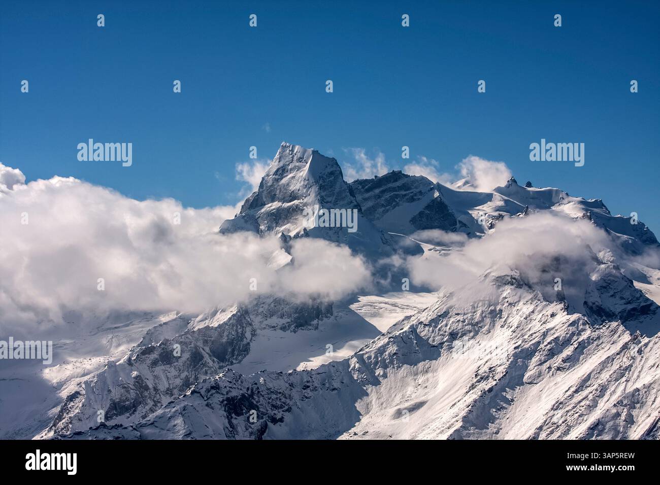 Aerial view of majestic snowy peaks in the himalayan mountain range ...