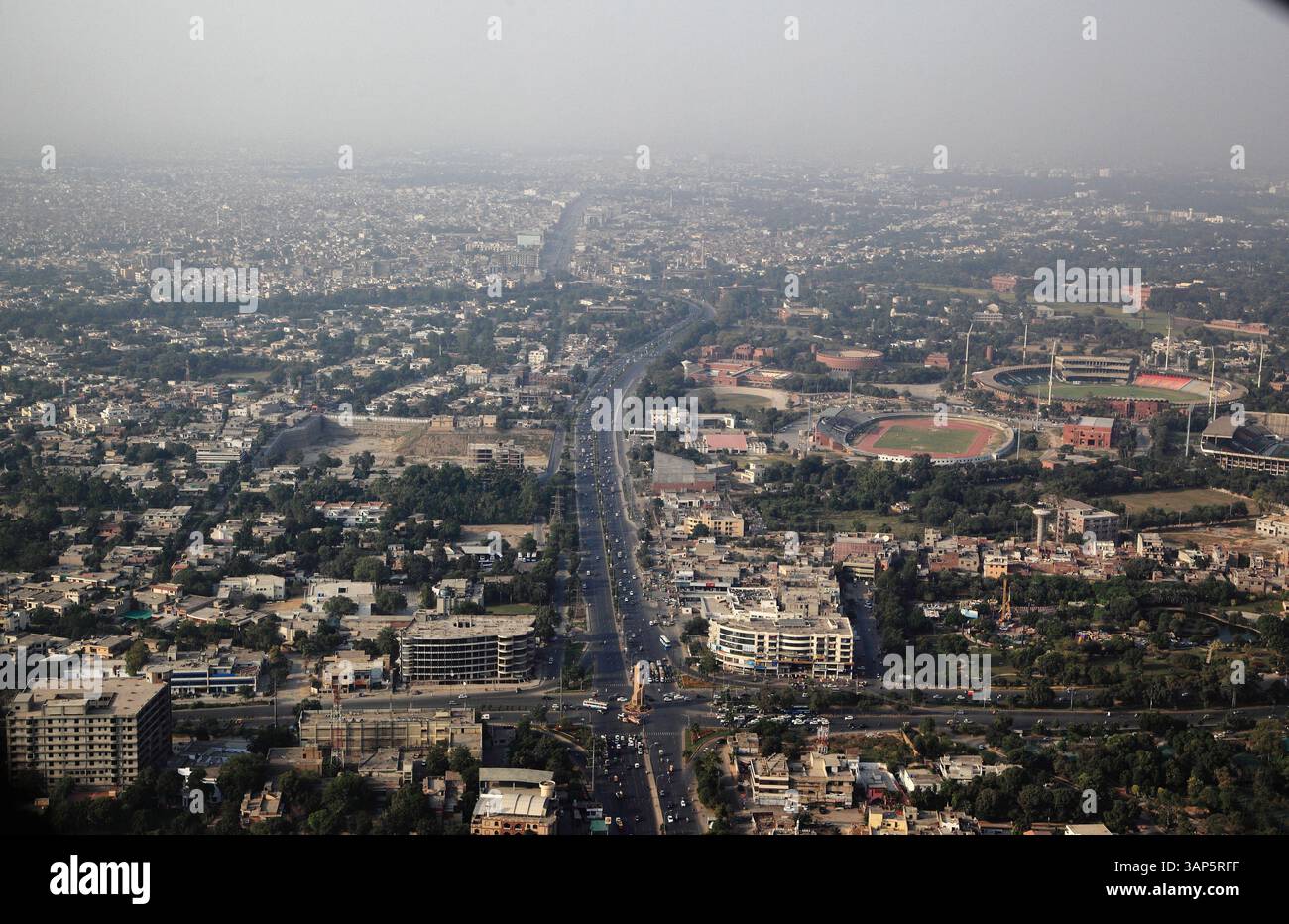 Aerial view of bustling urban cityscape with dense infrastructure and ...