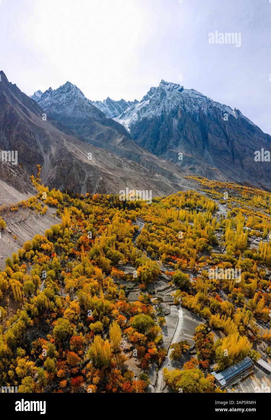 Aerial view of khorkundus valley with vibrant fall colors and snow ...