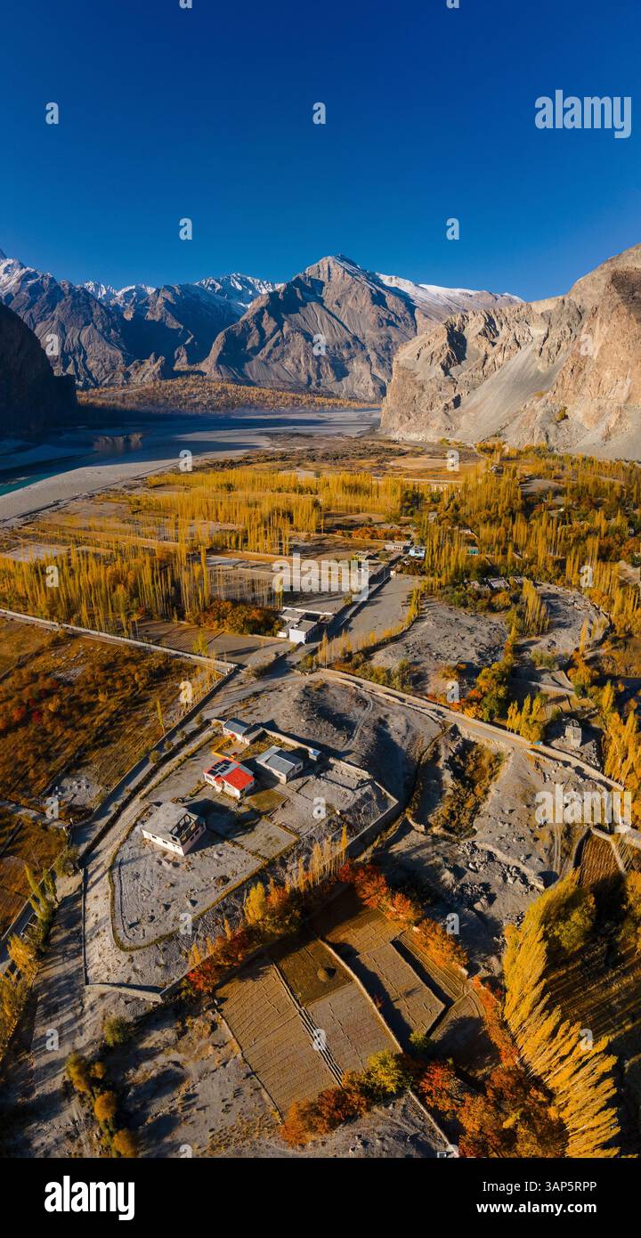 Aerial view of serene Sailing Valley with majestic mountains and a ...