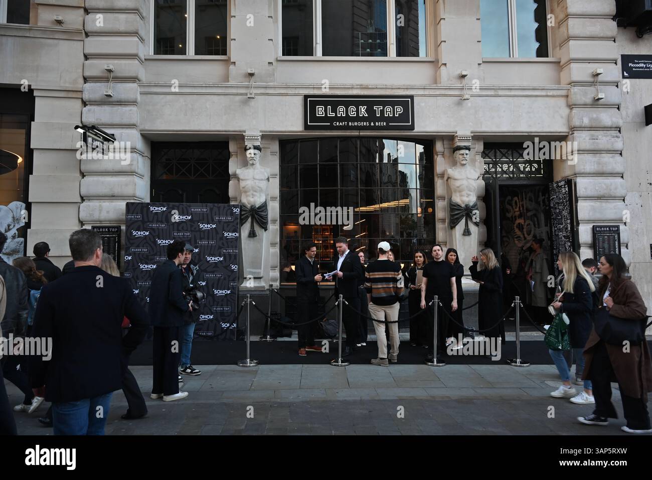 LONDON, ENGLAND - APRIL 15 2025: The Black Tap's at The black carpet ...
