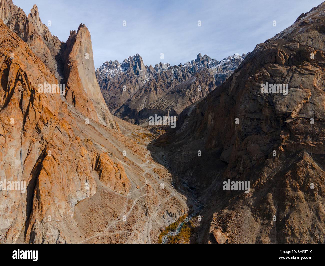 Aerial view of rugged rock formations and majestic mountains in ...
