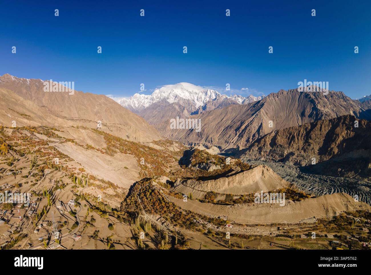 Aerial view of majestic Himalayas in snow-covered Hunza Valley, Gilgit ...