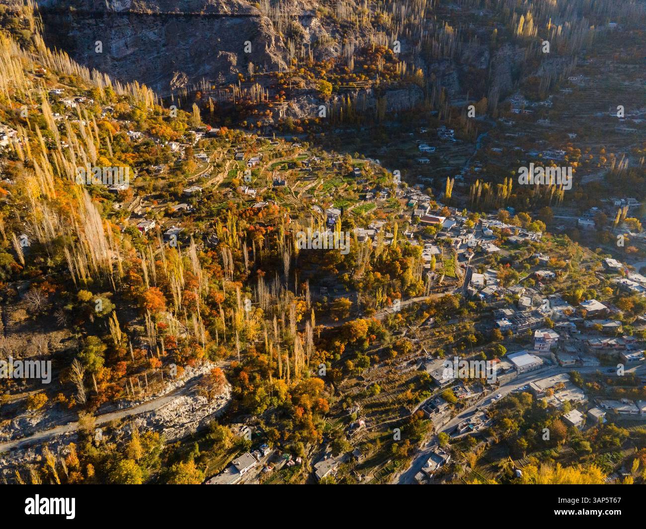 Aerial view of picturesque Hunza Valley with colorful autumn foliage ...