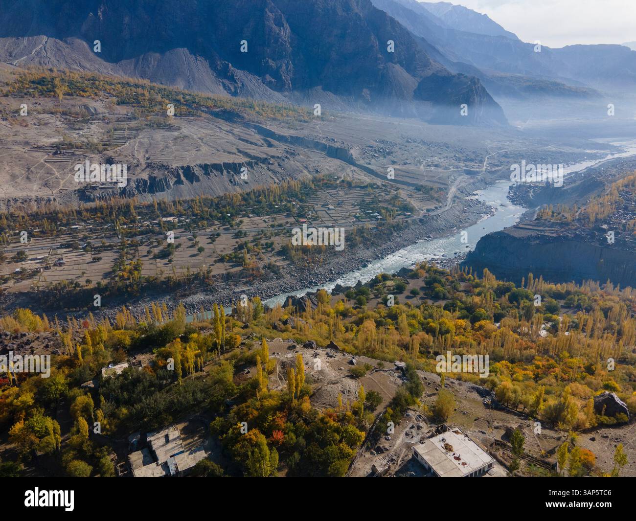 Aerial view of Indus River winding through mountains and valleys ...