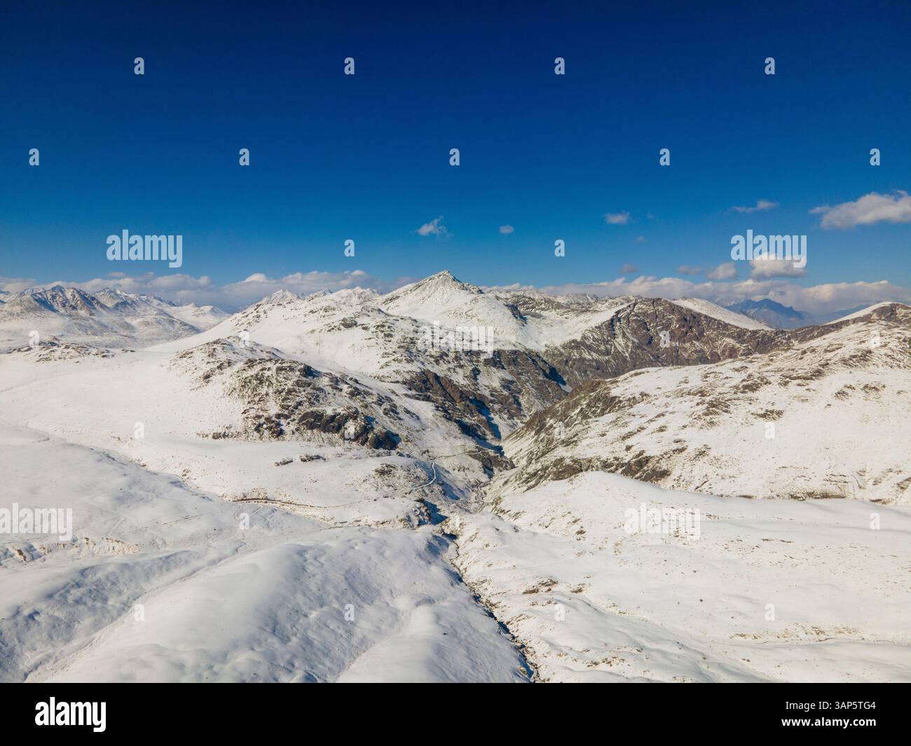 Aerial view of snow-capped mountains in Deosai National Park, Gilgit ...