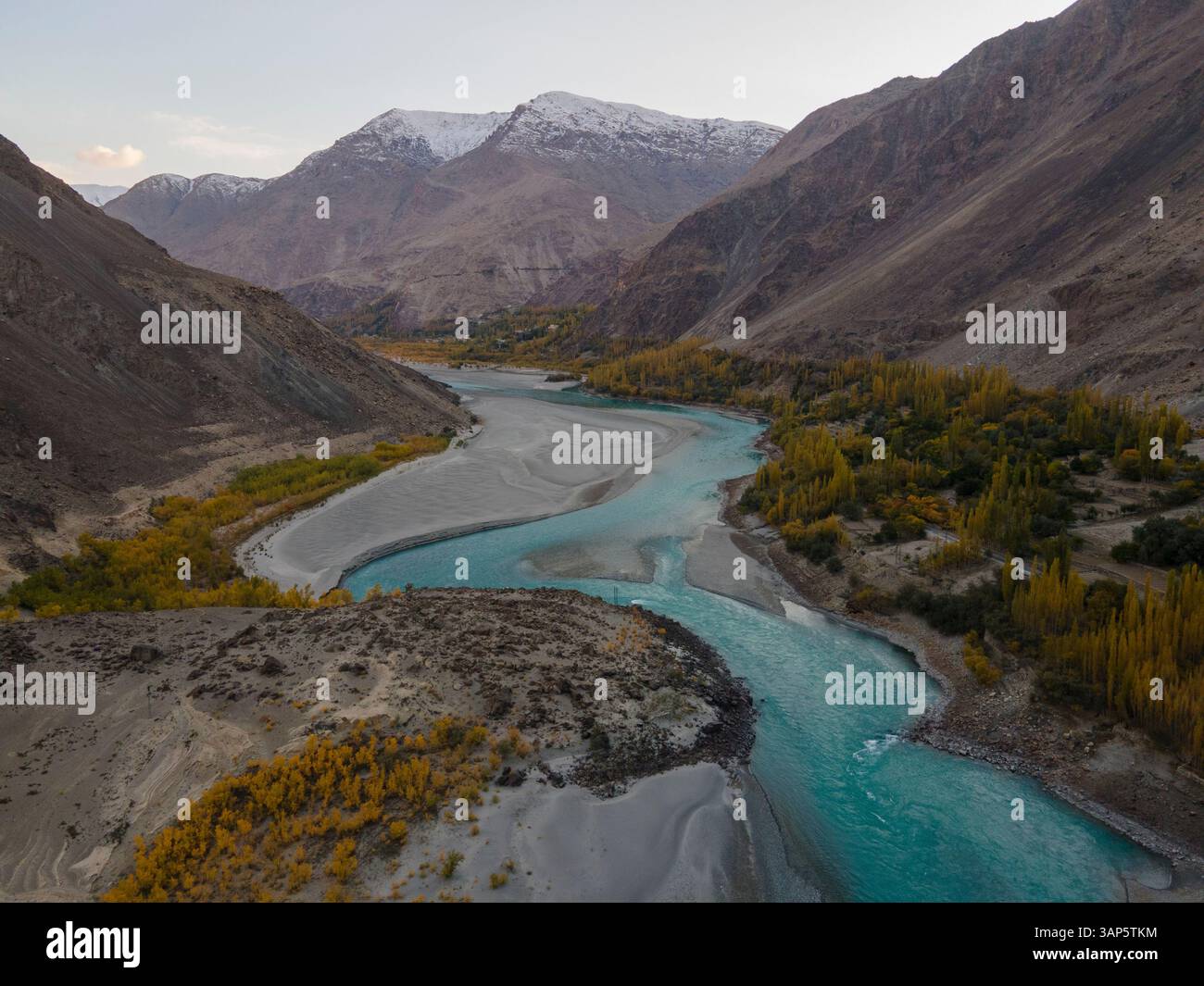 Aerial view of snowy Himalayan mountains and Indus River, Shirting ...