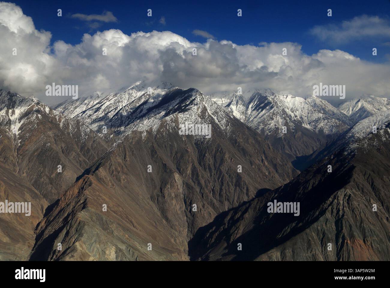 Aerial view of snowy mountains in winter, Skardu, Gilgit-Baltistan ...