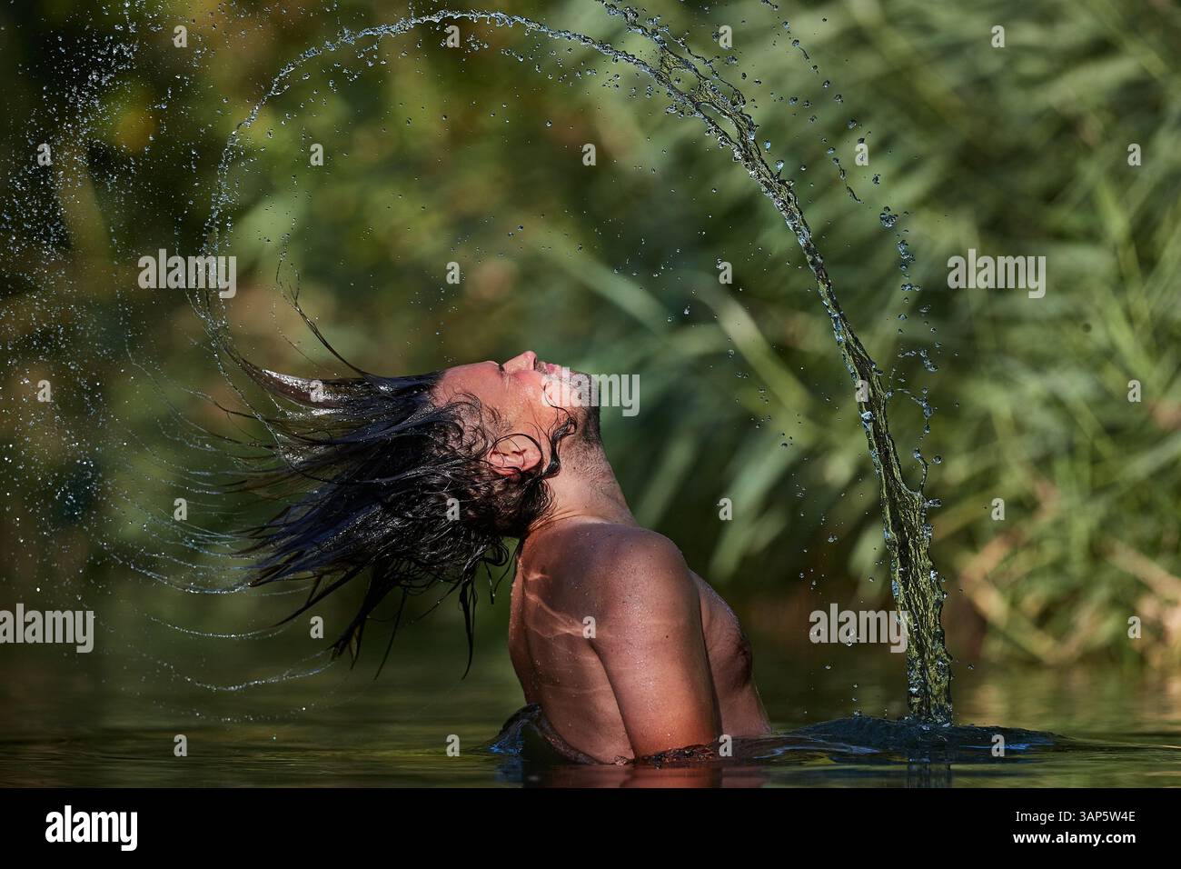 Hair whipping hi-res stock photography and images - Alamy