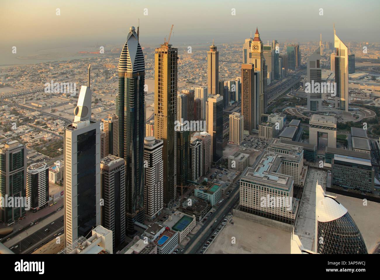 Aerial view of modern skyscrapers and bustling cityscape along Sheikh ...
