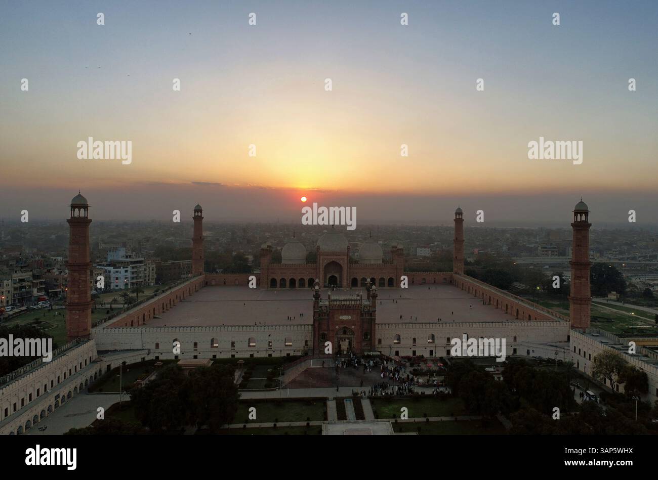 Aerial view of Mosque at sunset with cityscape and minarets, Lahore ...