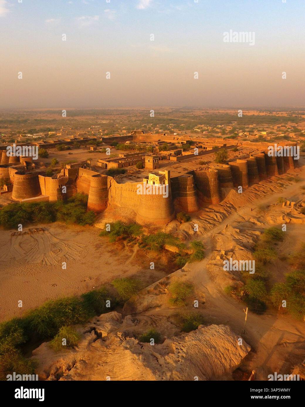 Aerial view of ancient Shah Abbasi Jamia Masjid Fort amidst desert ...