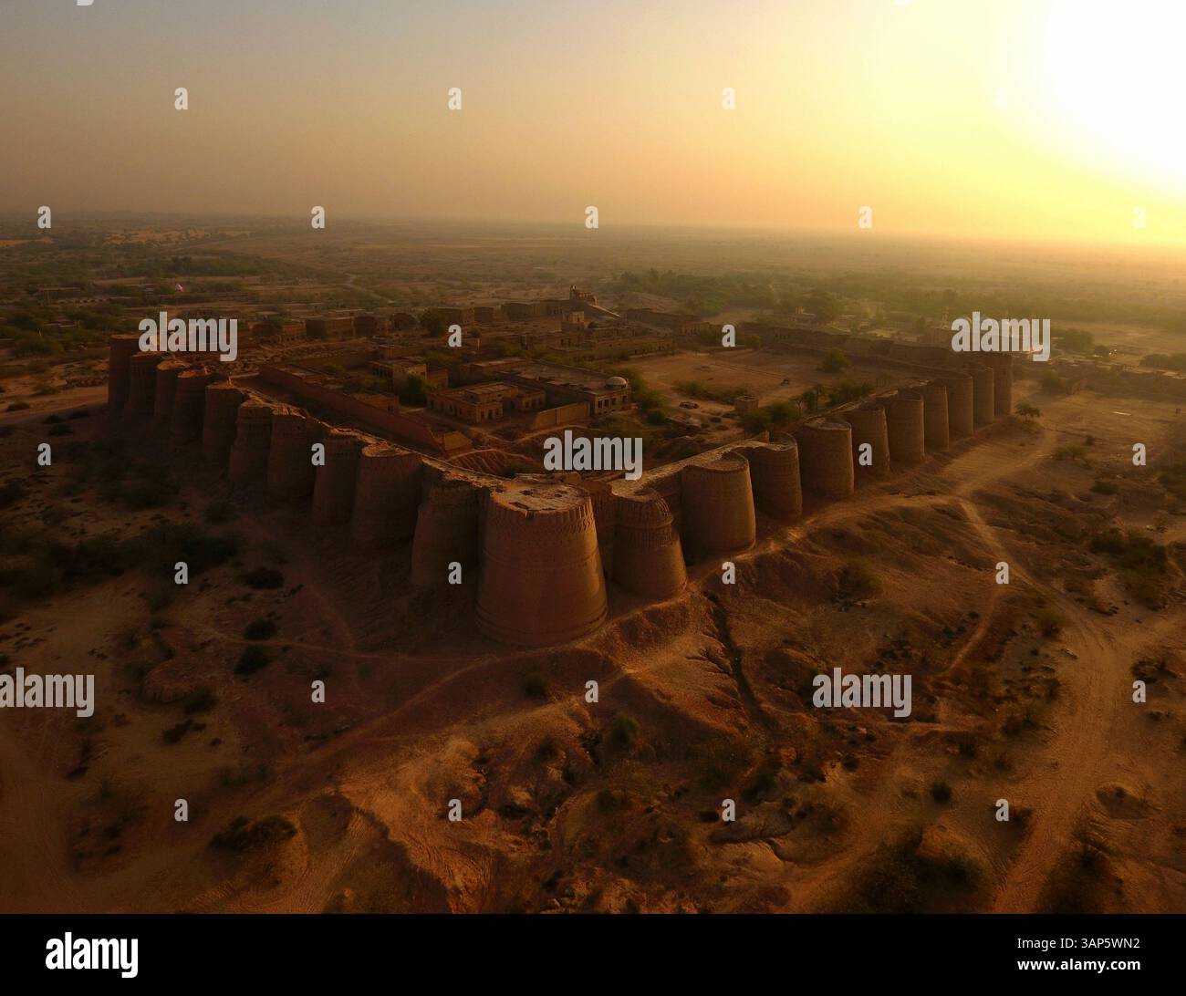 Aerial view of Shah Abbasi Jamia Masjid Fort at sunset in desert ...