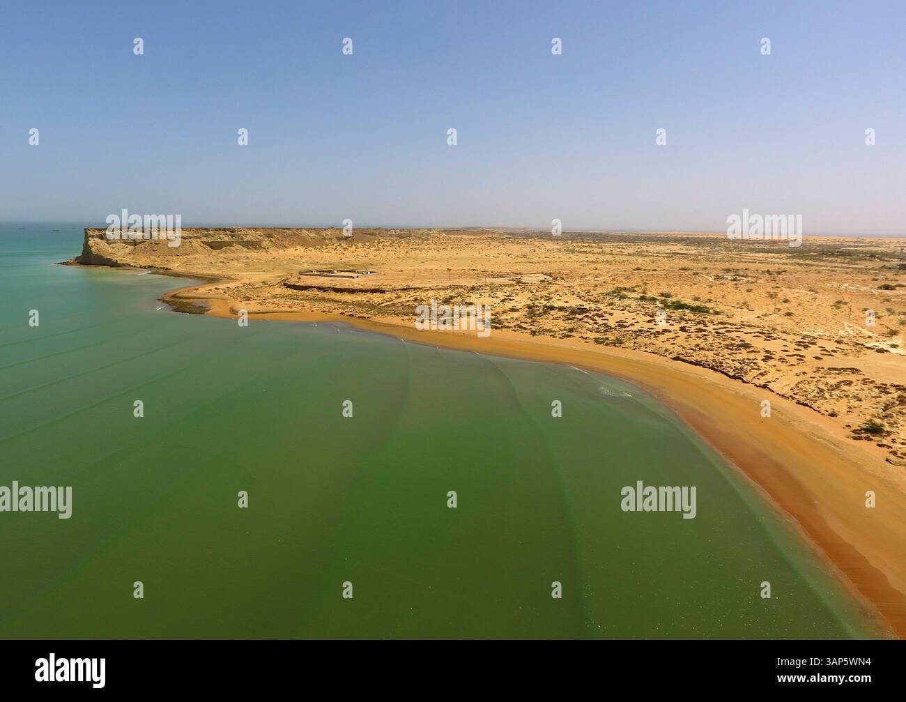 Aerial view of pristine sandy beach and ocean shoreline, Paddi Zirr ...