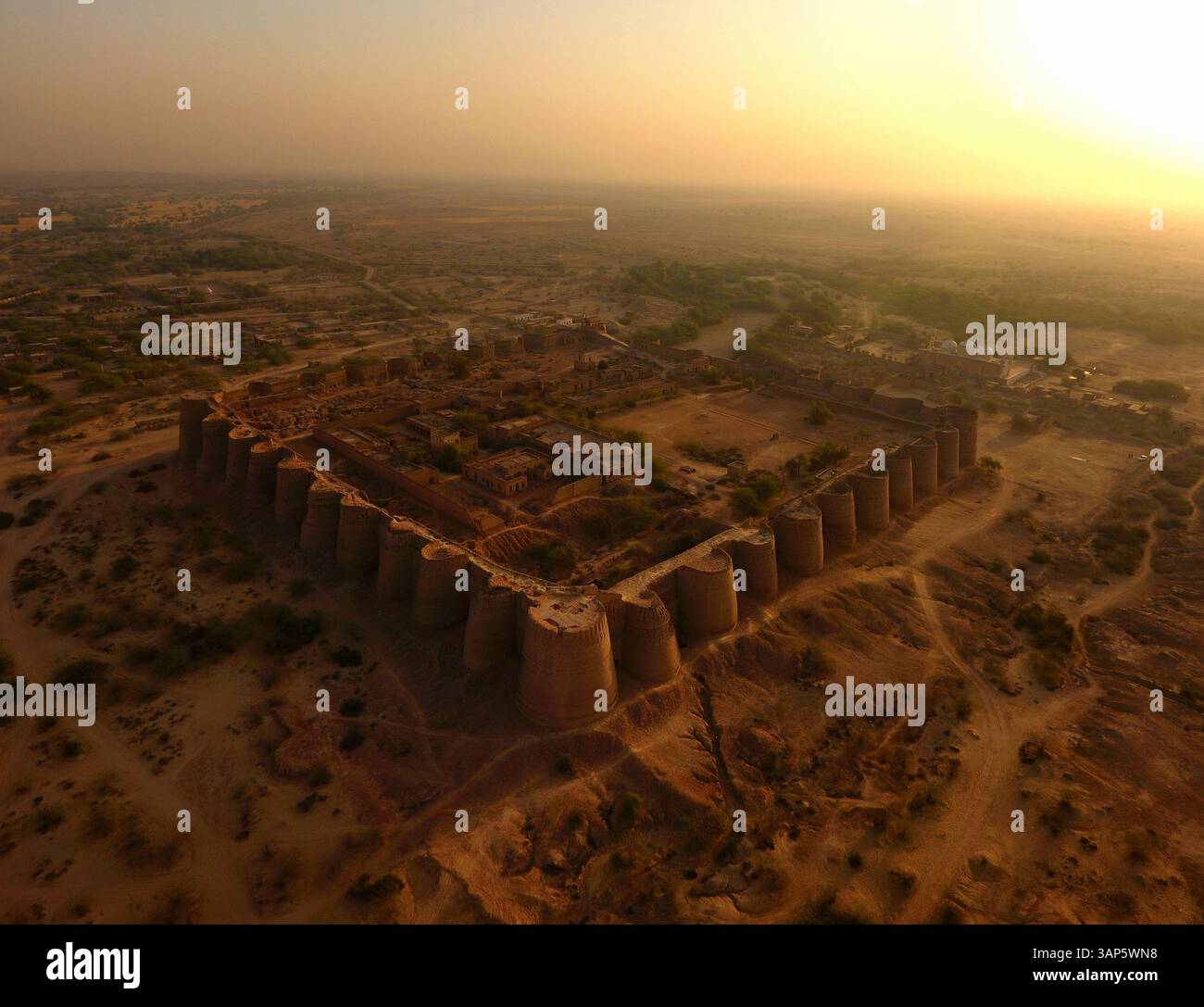 Aerial view of Shah Abbasi Jamia Masjid Fort at sunset in desert ...