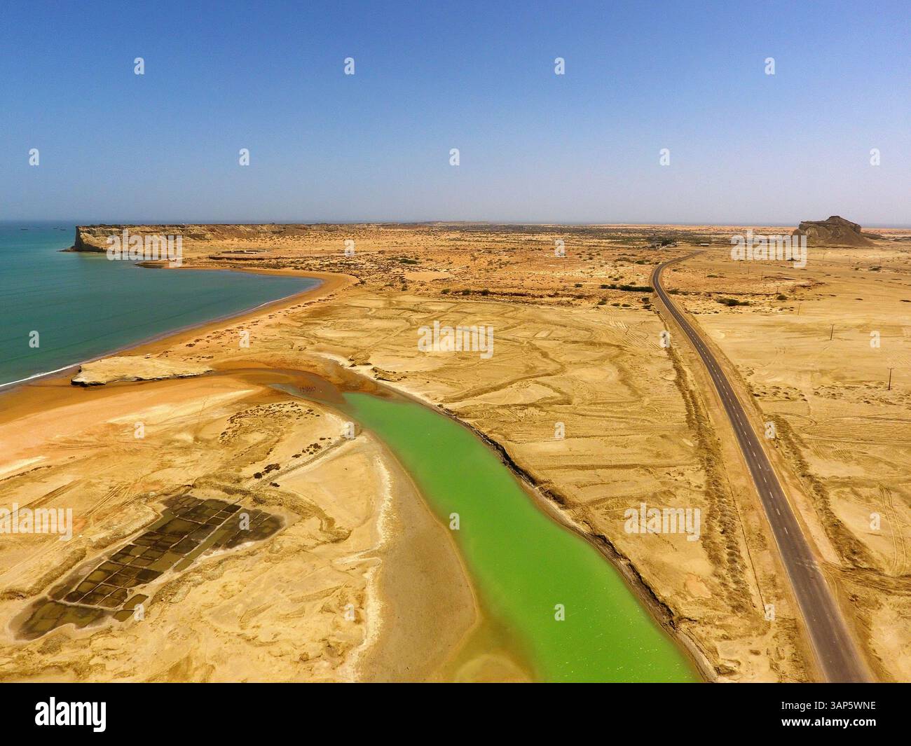 Aerial view of beautiful coastal road along Paddi Zirr Gulf, Gwadar ...