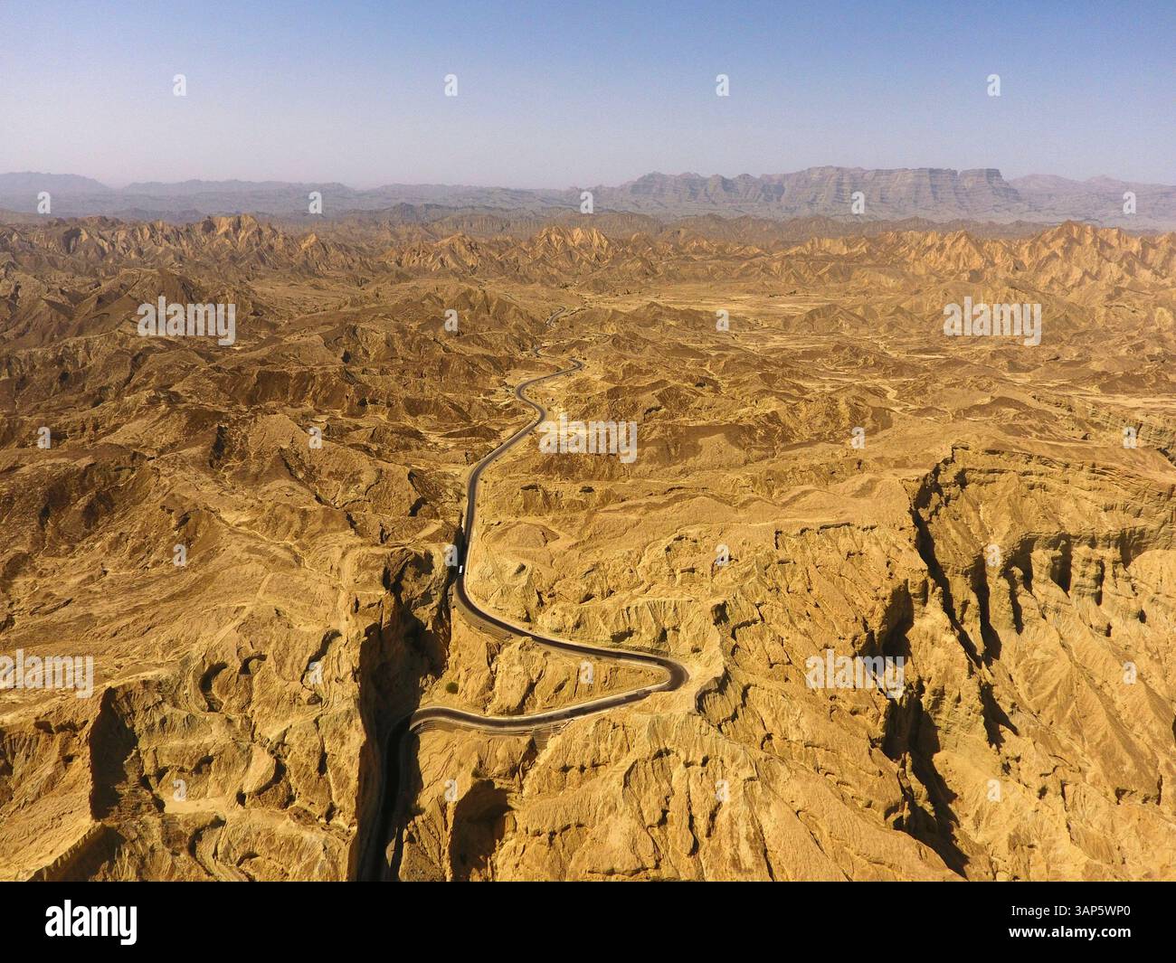 Aerial view of majestic mountains and canyon with road, Ormara ...