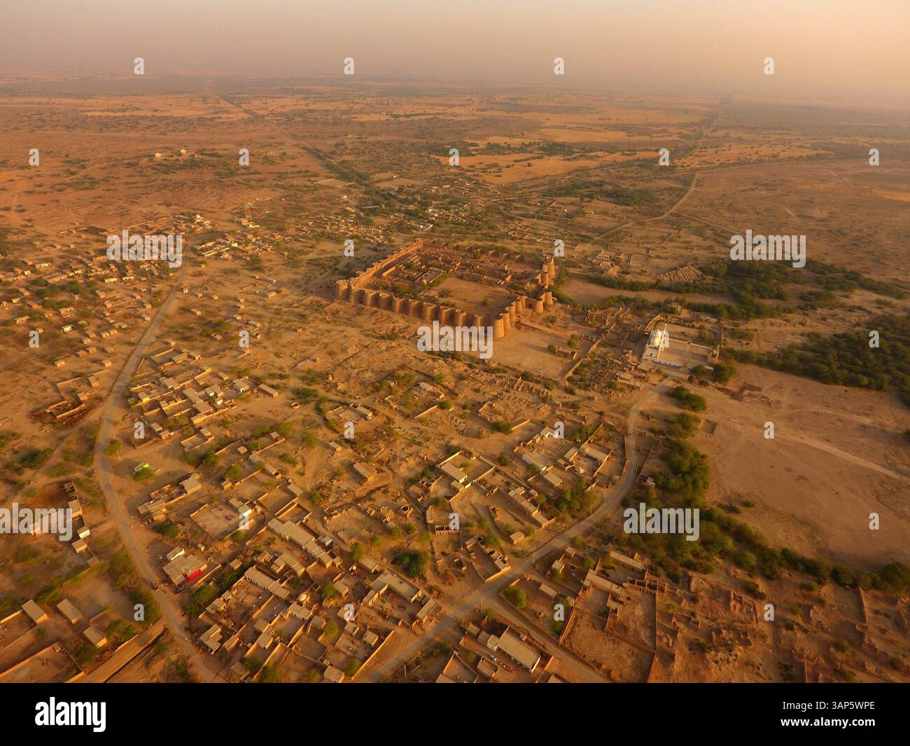Aerial view of Shah Abbasi Jamia Masjid Fort and village houses in ...