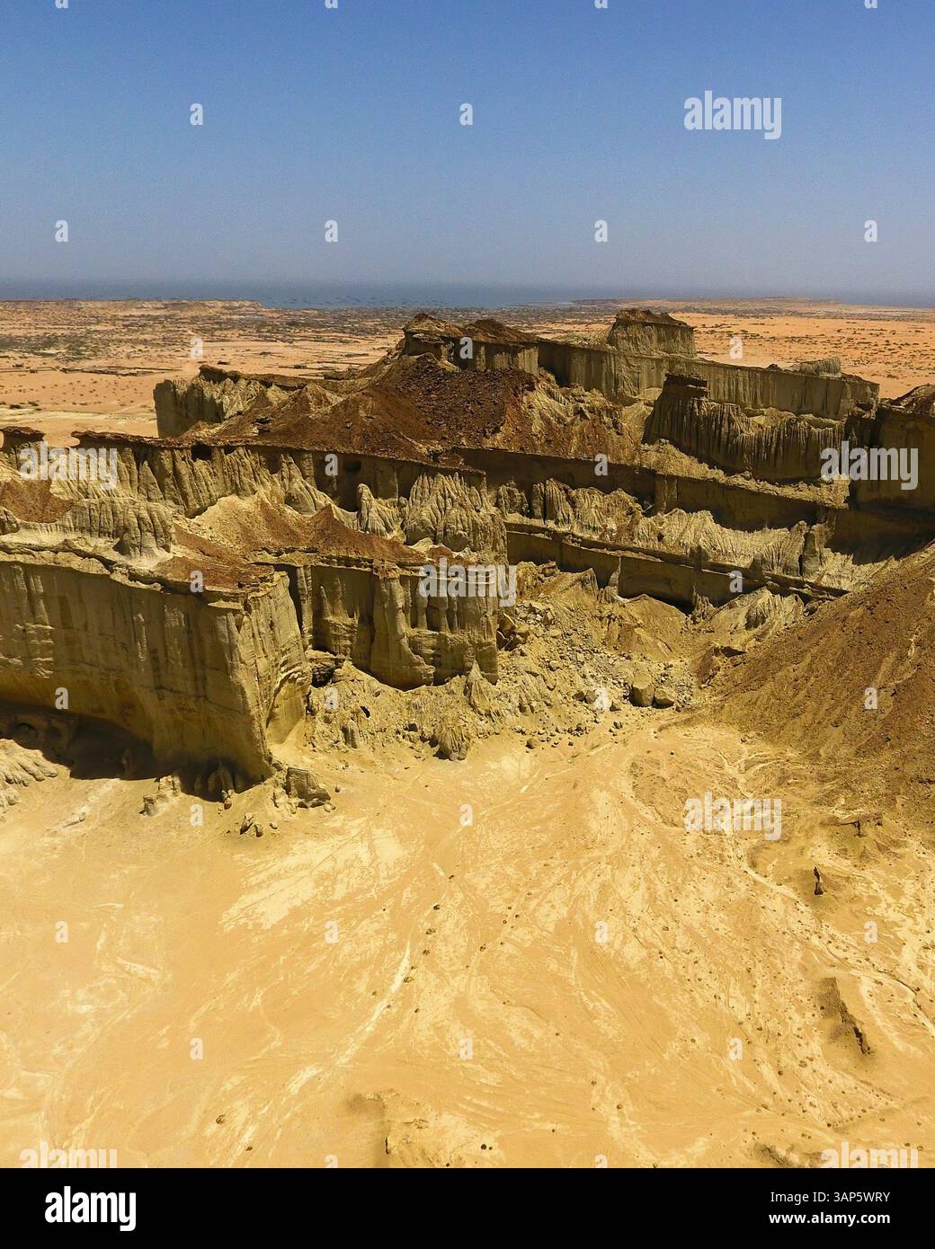 Aerial view of barren desert cliffs and rugged rocks, Gwadar ...