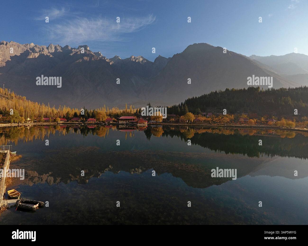 Aerial view of tranquil Shangri-La with crystal clear lake, majestic ...