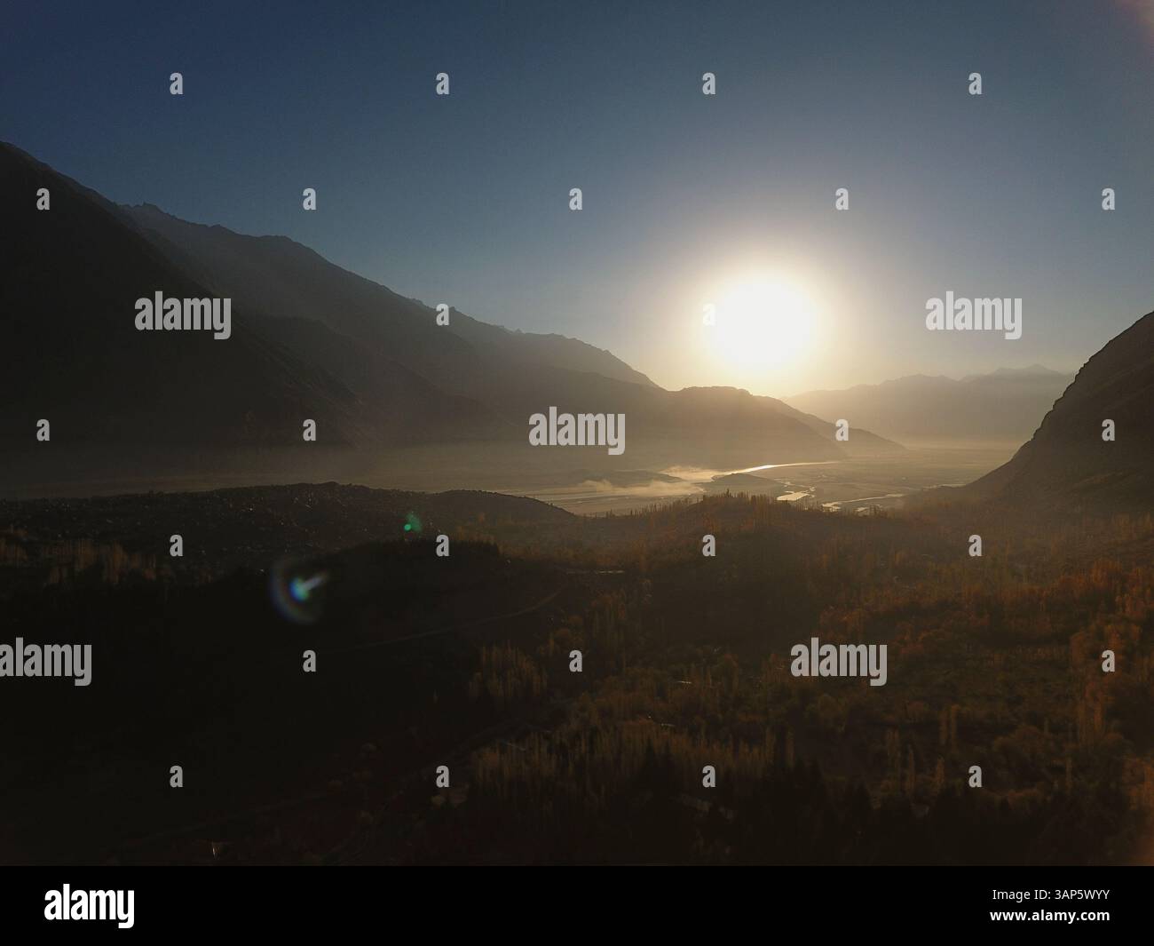 Aerial view of majestic mountains and serene valley at Shangri-La ...