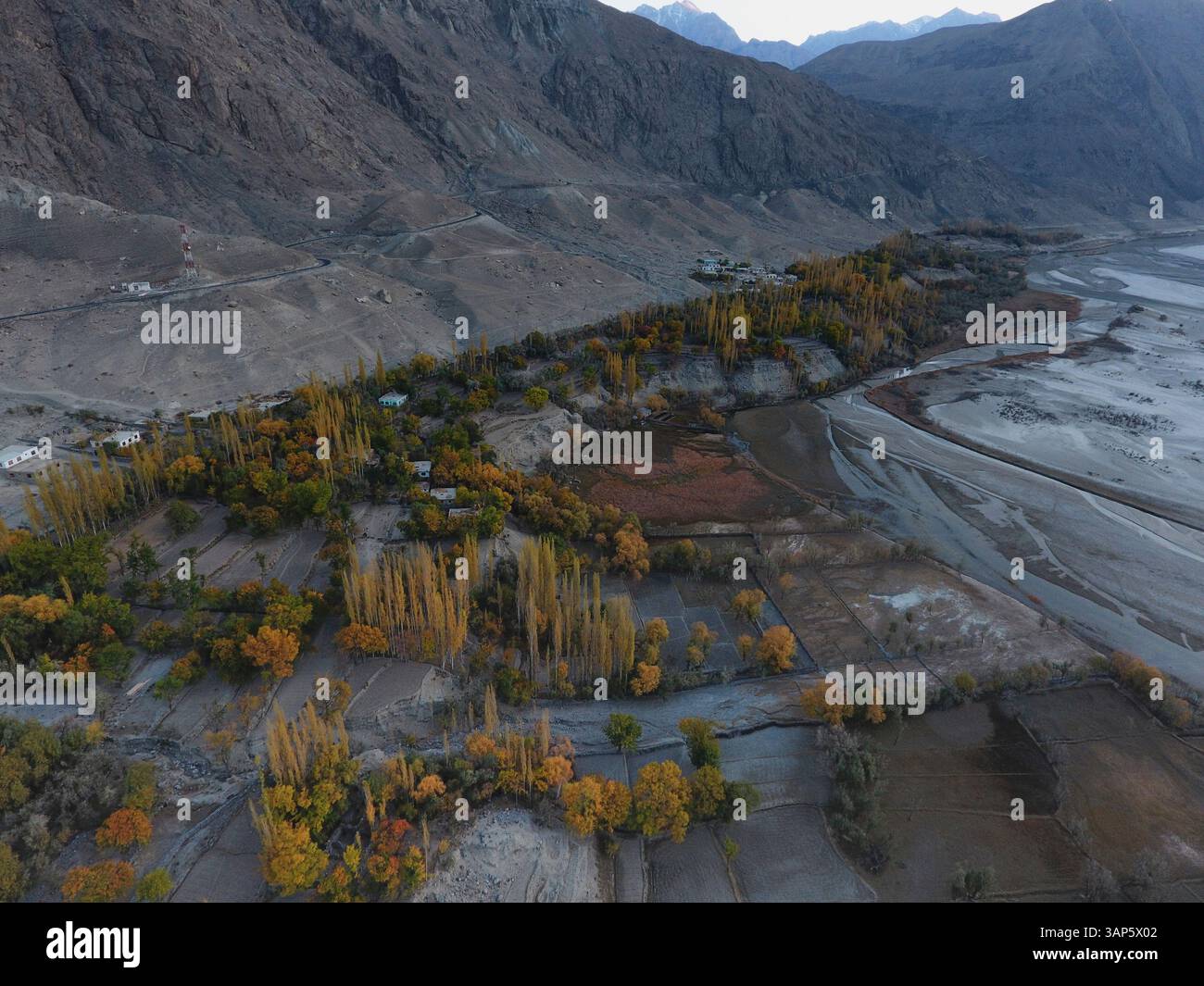 Aerial view of majestic Himalayan mountains and serene valley with ...