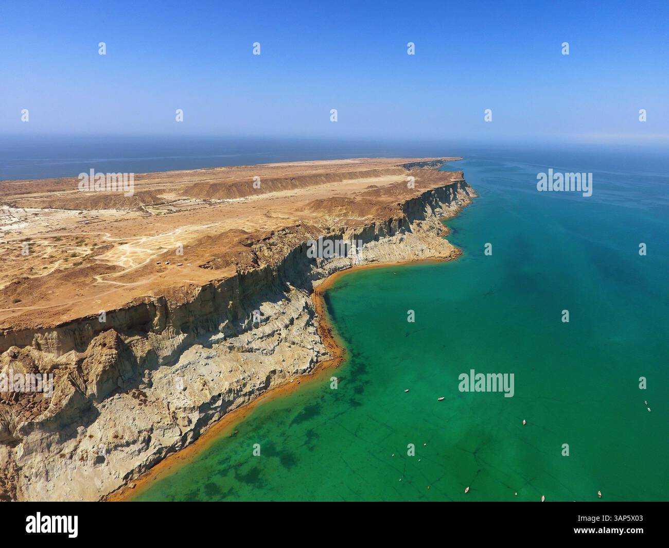 Drone along rocky cliff coastline hi-res stock photography and images ...