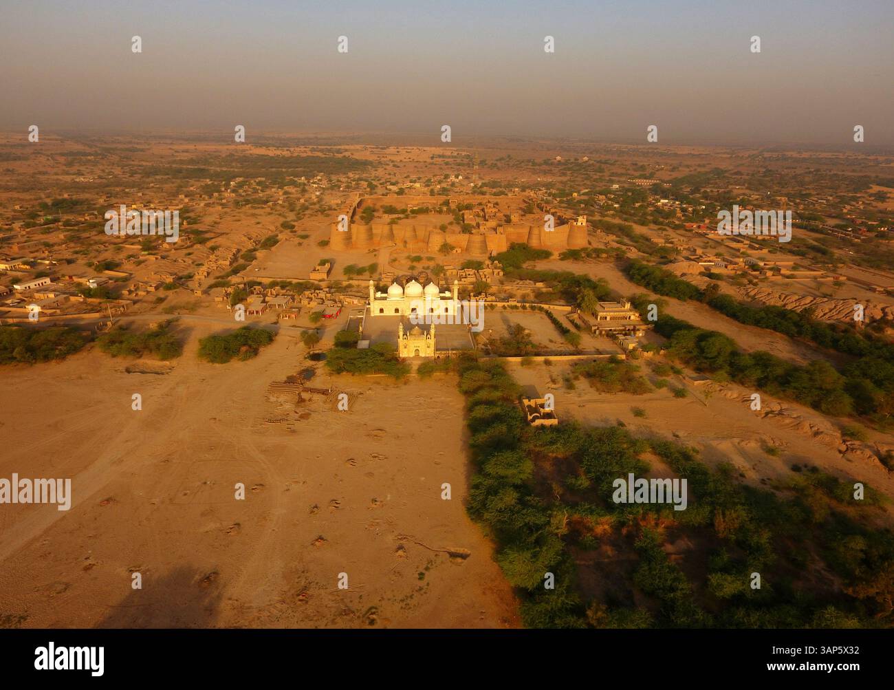 Aerial view of Shah Abbasi Jamia Masjid Fort at sunset in desert ...