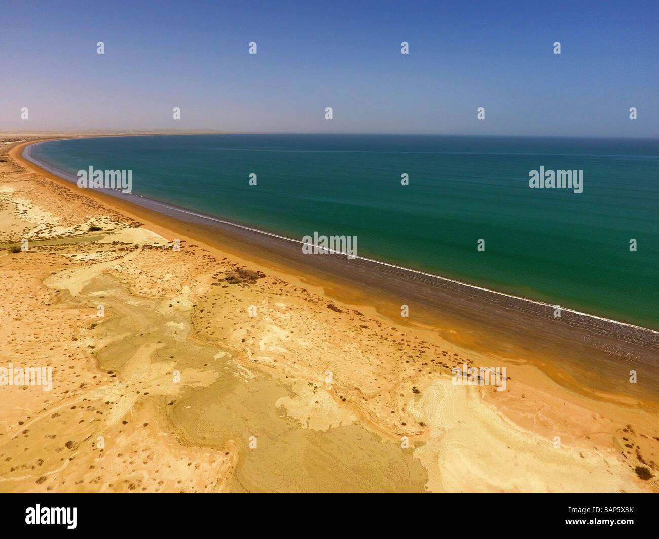 Aerial view of serene and tranquil beach along Paddi Zirr Gulf, Gwadar ...