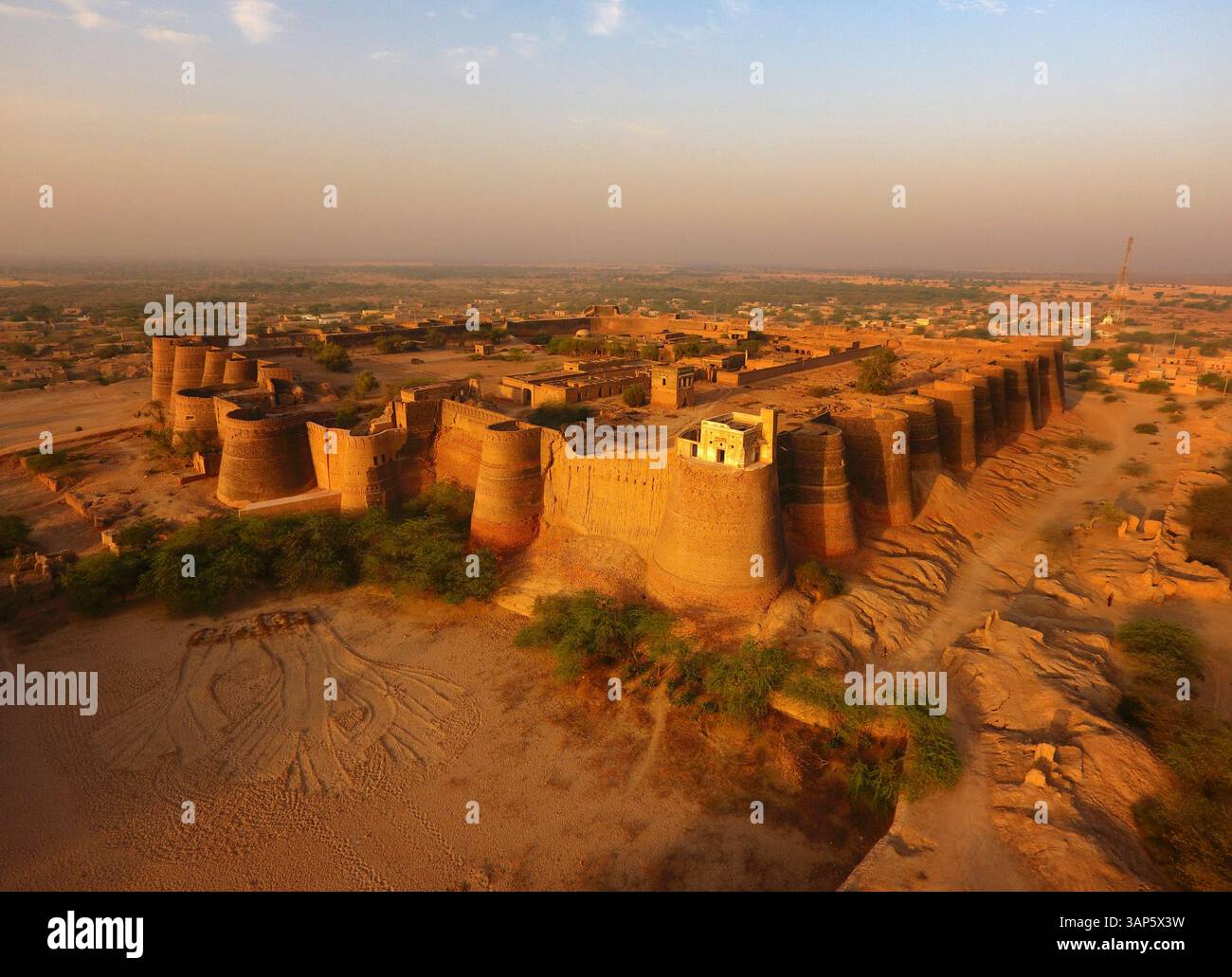 Aerial view of Shah Abbasi Jamia Masjid Fort at sunset in desert ...