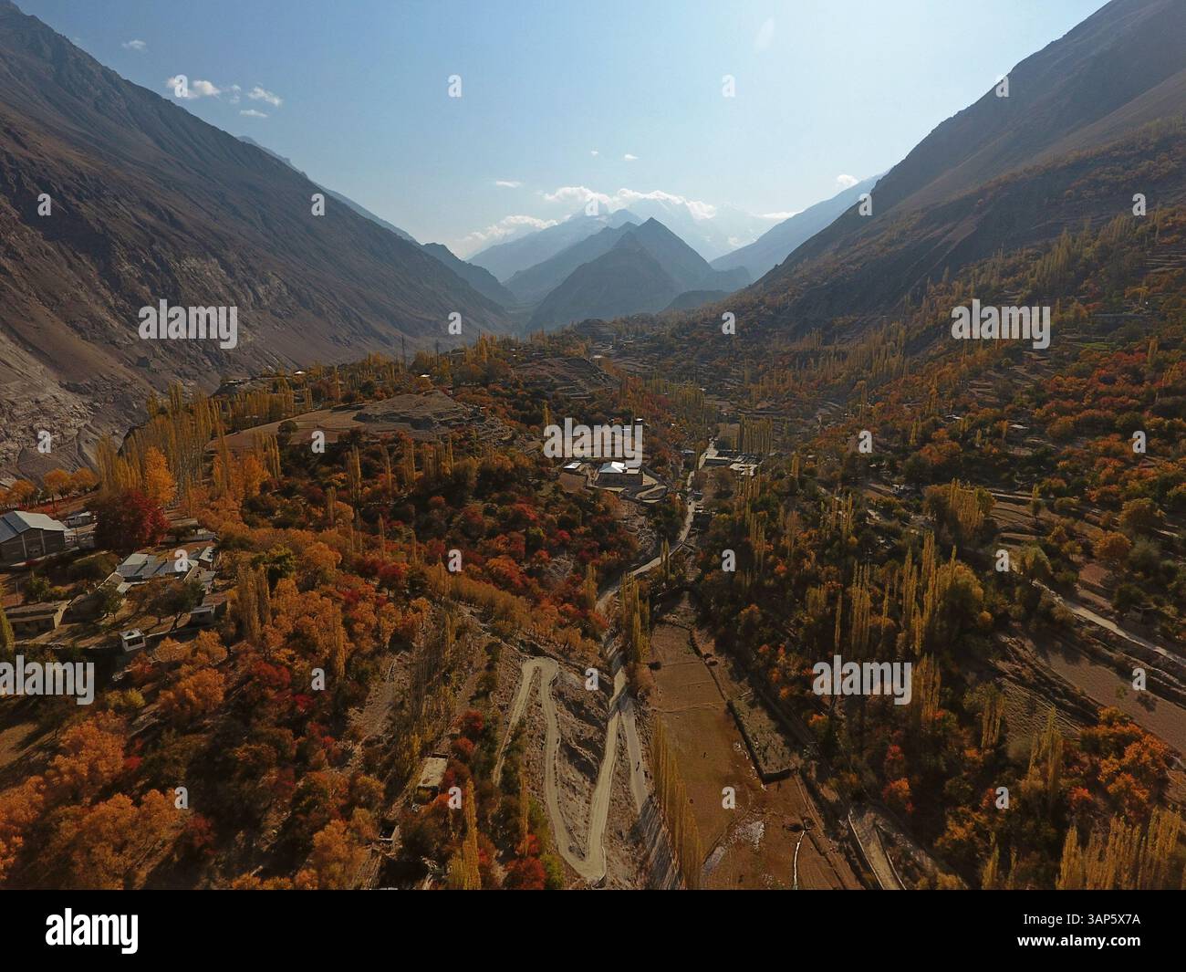 Aerial view of majestic Himalayan mountains and remote village in Oyum ...