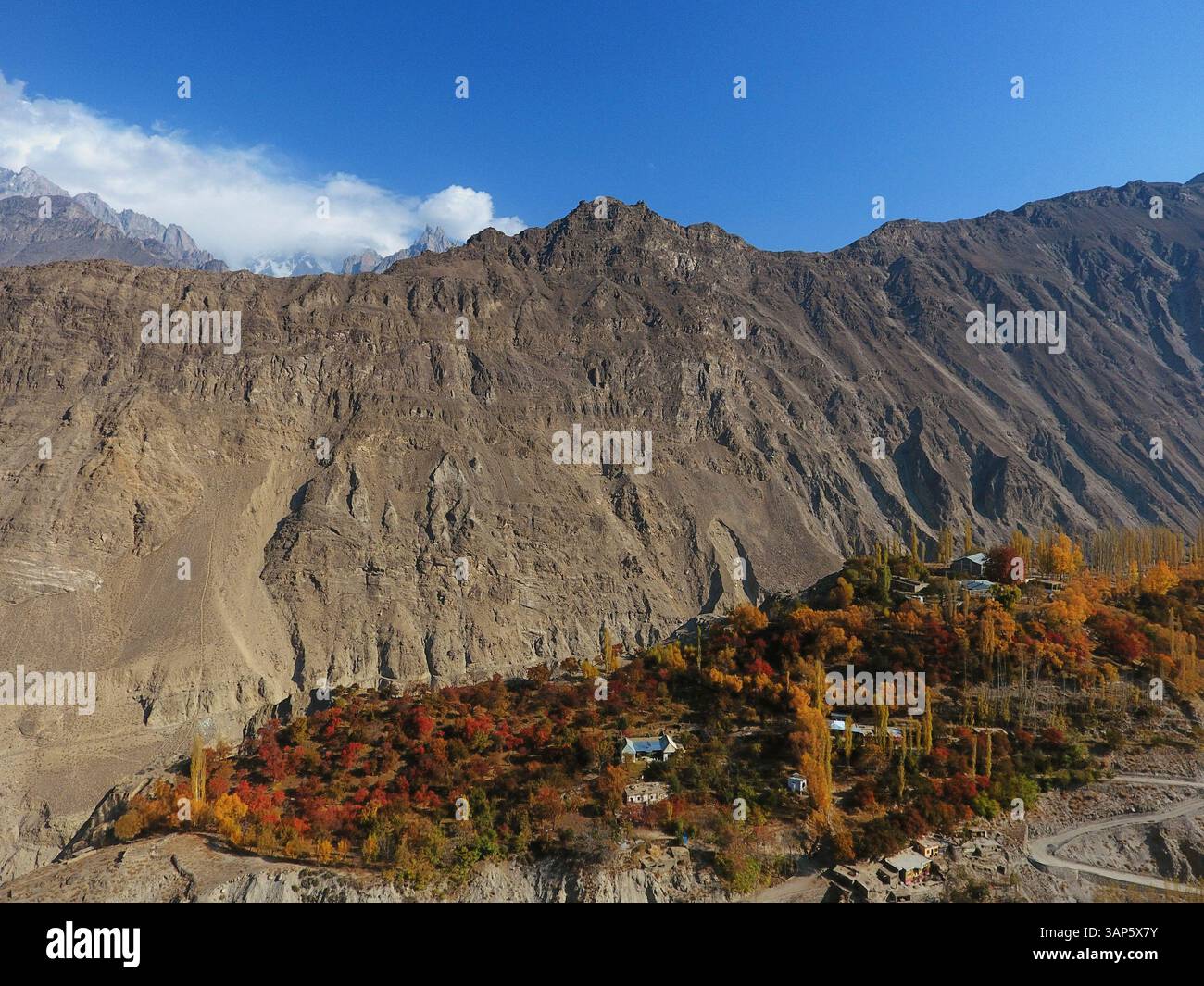 Aerial view of autumn village nestled in the Himalayas, Oyum-Nagar ...