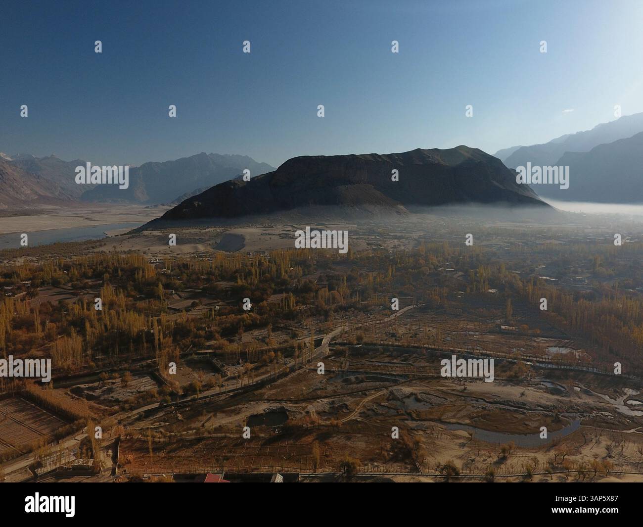 Aerial view of majestic Katpana Desert and rugged mountain range ...