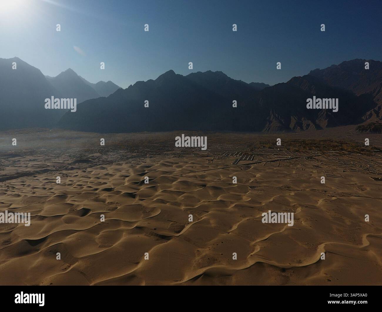 Aerial view of vast, remote Katpana Desert with sand dunes and ...