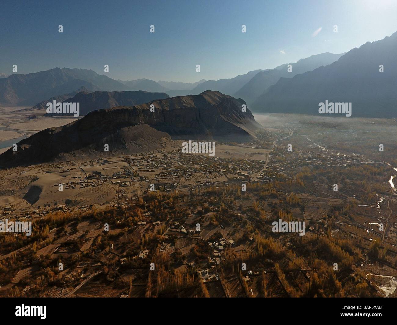 Aerial view of majestic mountain valley village, Gilgit-Baltistan ...