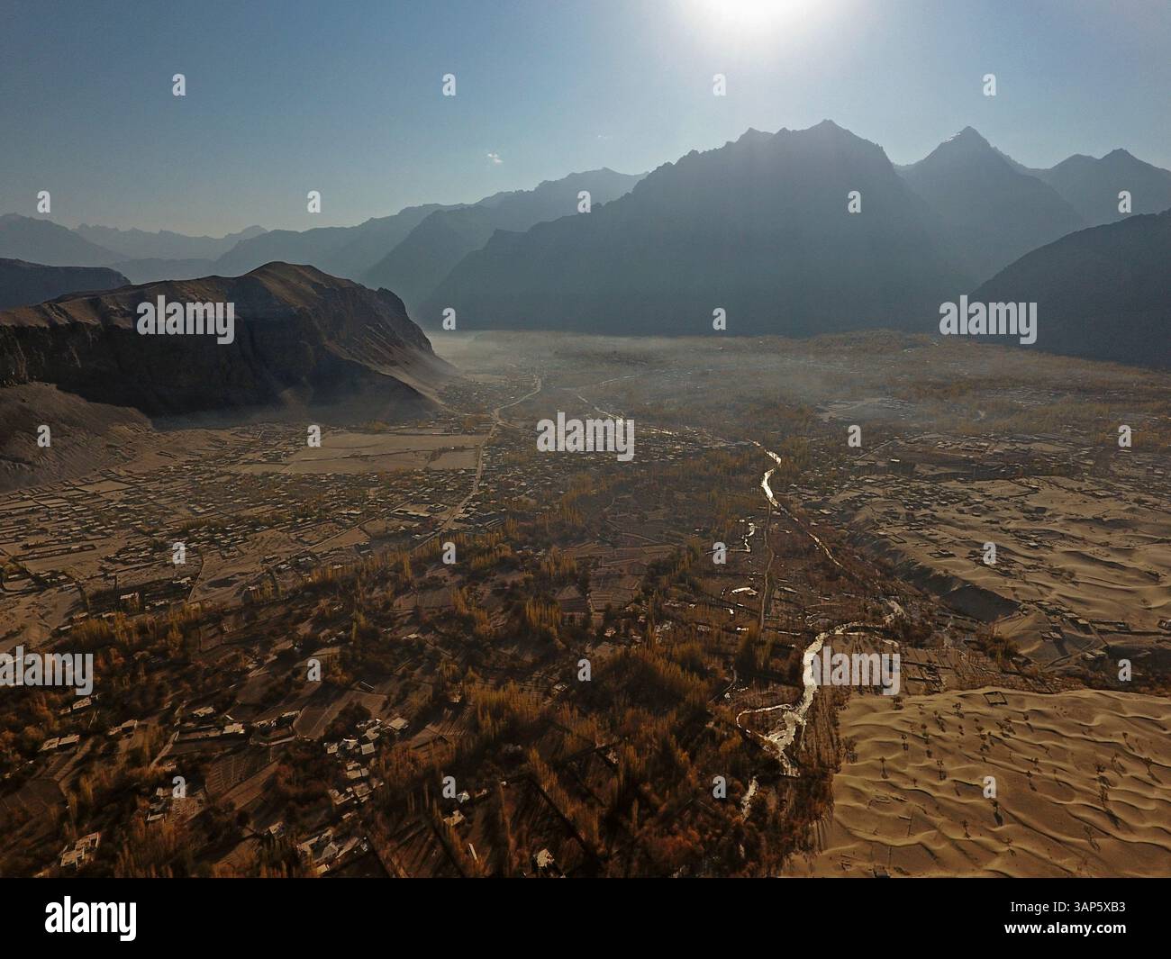 Aerial view of expansive mountain range and arid desert in Gilgit ...