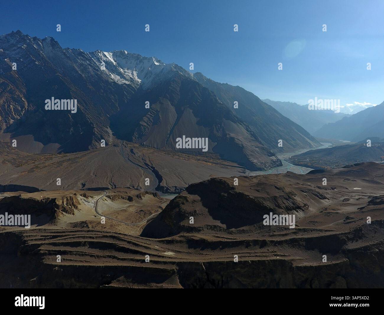 Aerial view of majestic Hunza Valley with snow-capped mountains, Gilgit ...