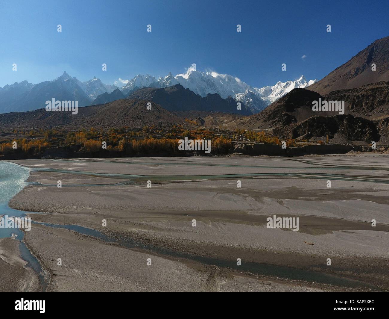 Aerial view of snow-covered Himalayas and Hunza Valley, Gilgit ...