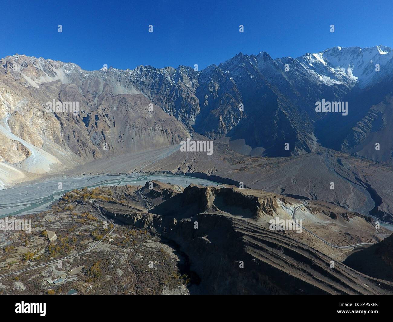Aerial view of majestic mountains and glacier in Hunza, Passu Cones ...