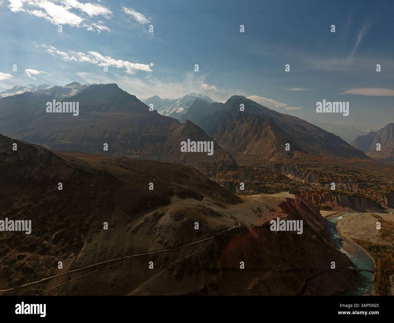Aerial view of majestic mountain range and rugged valley, Hopar Valley ...