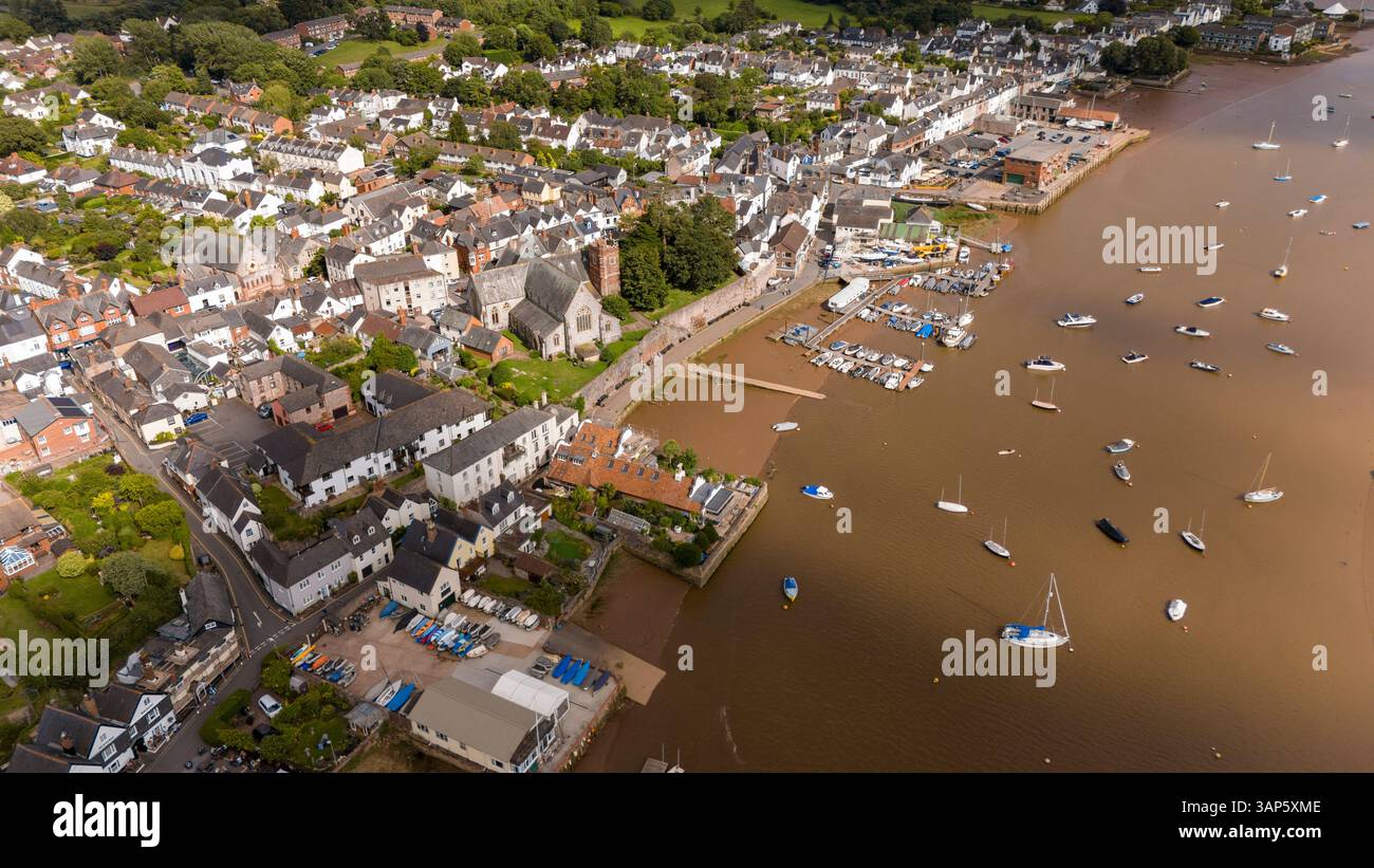 Aerial view of the scenic River Exe with boats and beautiful houses in ...