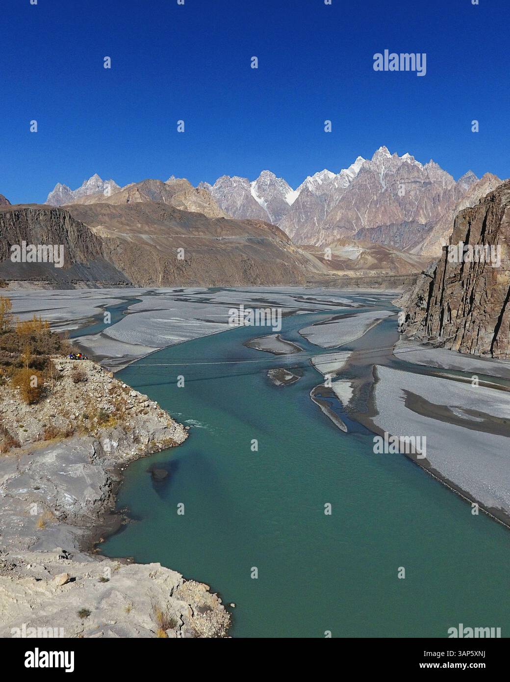Aerial view of majestic Passu Cones and Hunza River in dramatic ...