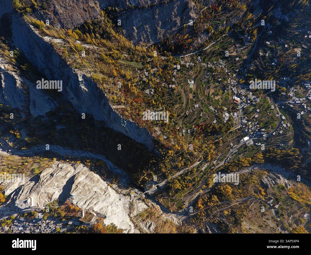 Aerial view of Hunza Valley with terrace farming, rock formations, and ...