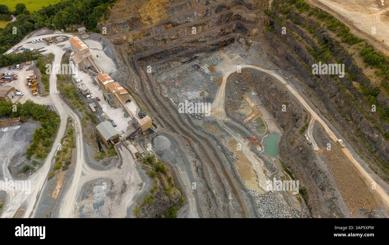 Aerial view of an industrial quarry with machinery and equipment in a ...