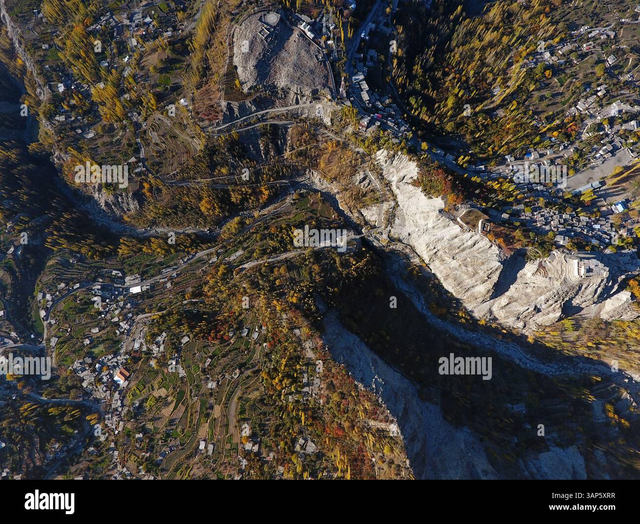 Aerial view of picturesque Hunza Valley with village homes and terrace ...